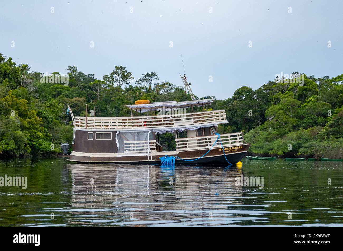 River boat docked by the bank of Rio Negro, a main tributaty to the ...