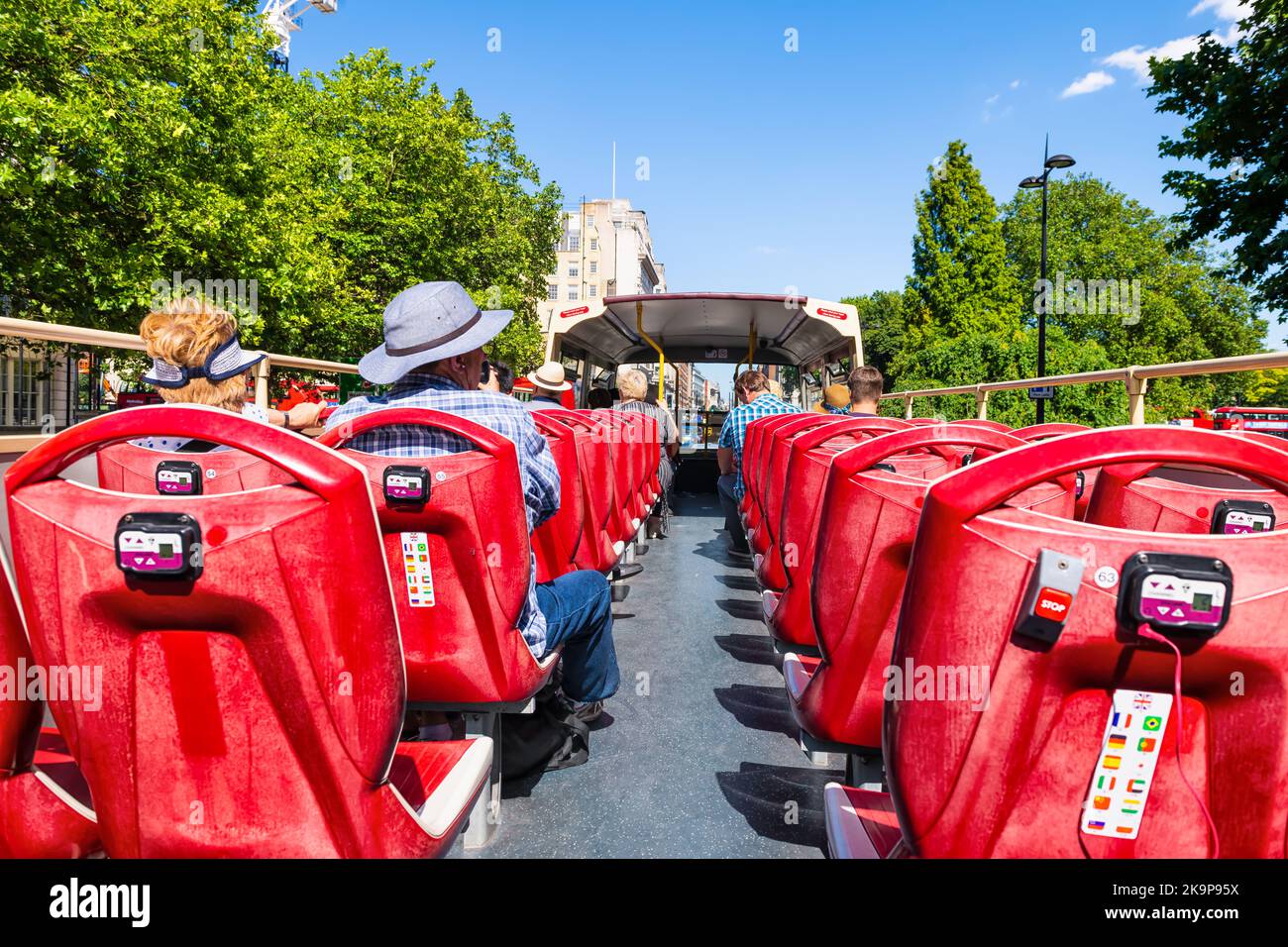 London, United Kingdom - June 22, 2018: Senior people tourists riding ...