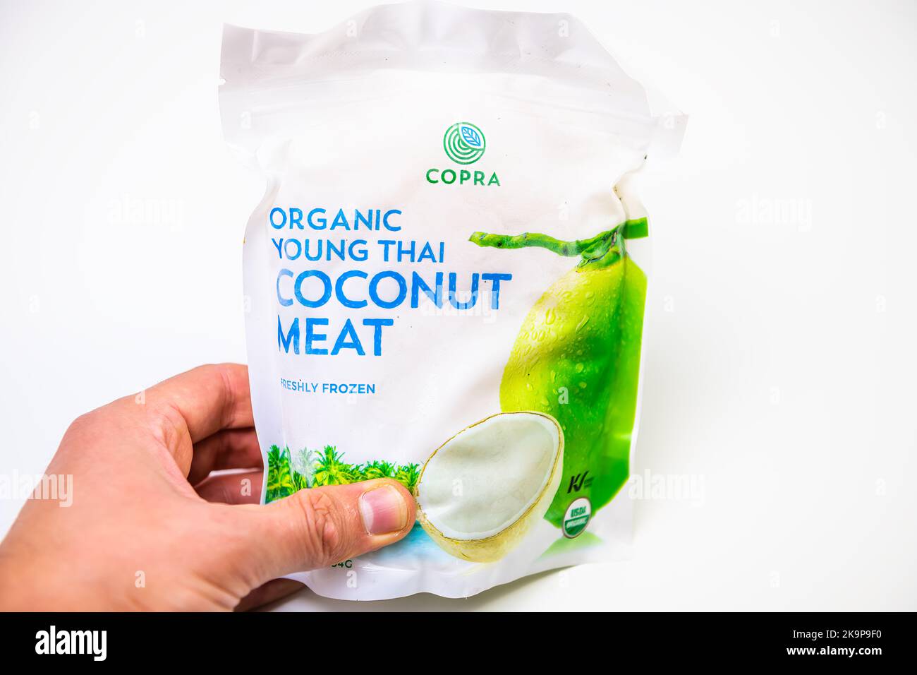 Naples, USA - October 21, 2021: Product label of organic thai Copra ...