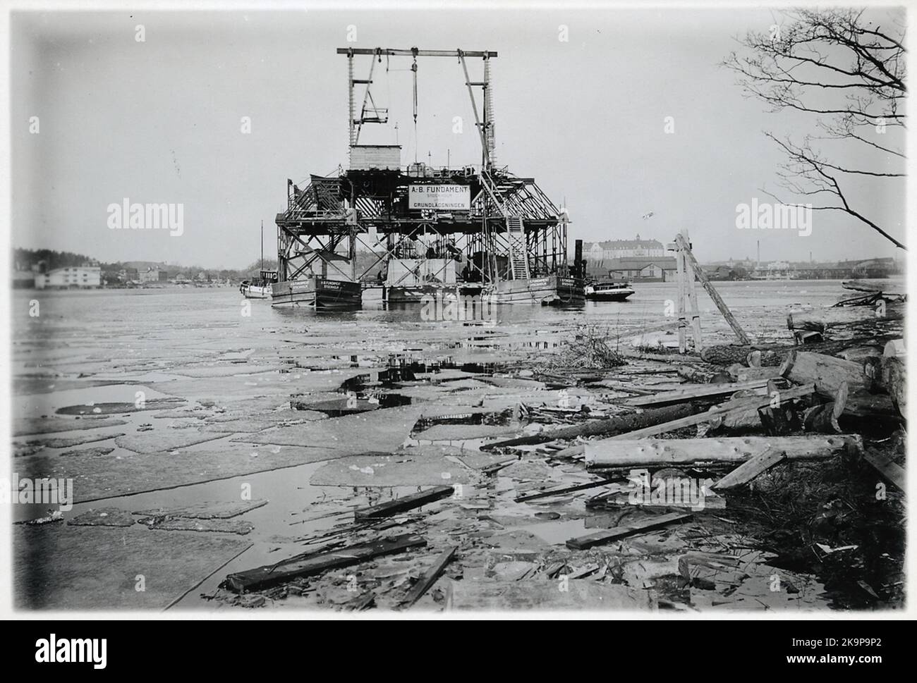 The barge is used to cast the cashier to Årstabron Stock Photo - Alamy