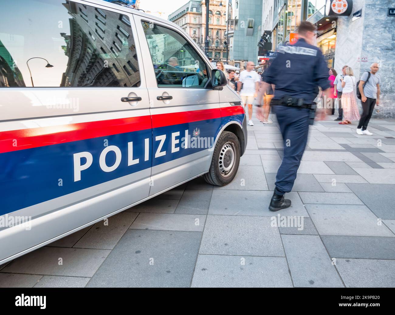 Vienna, Austria - June 2022: Police car and officer patrolling in the ...