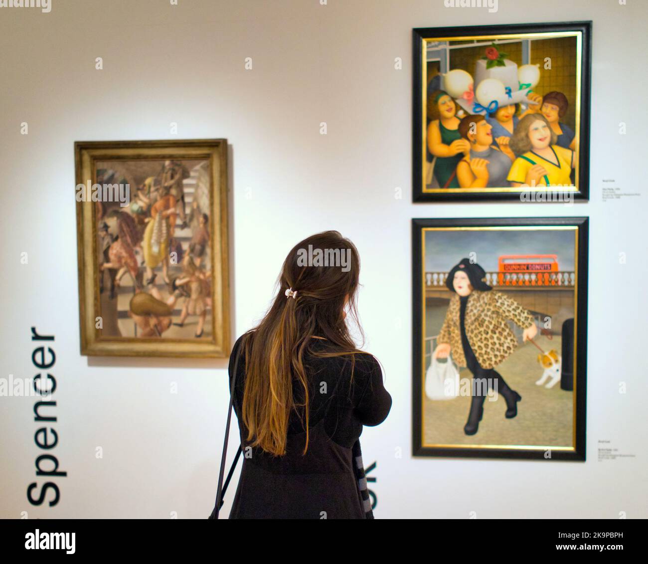 Girl woman Tourist enjoy the galleries at the goma or. Glasgow museum ...