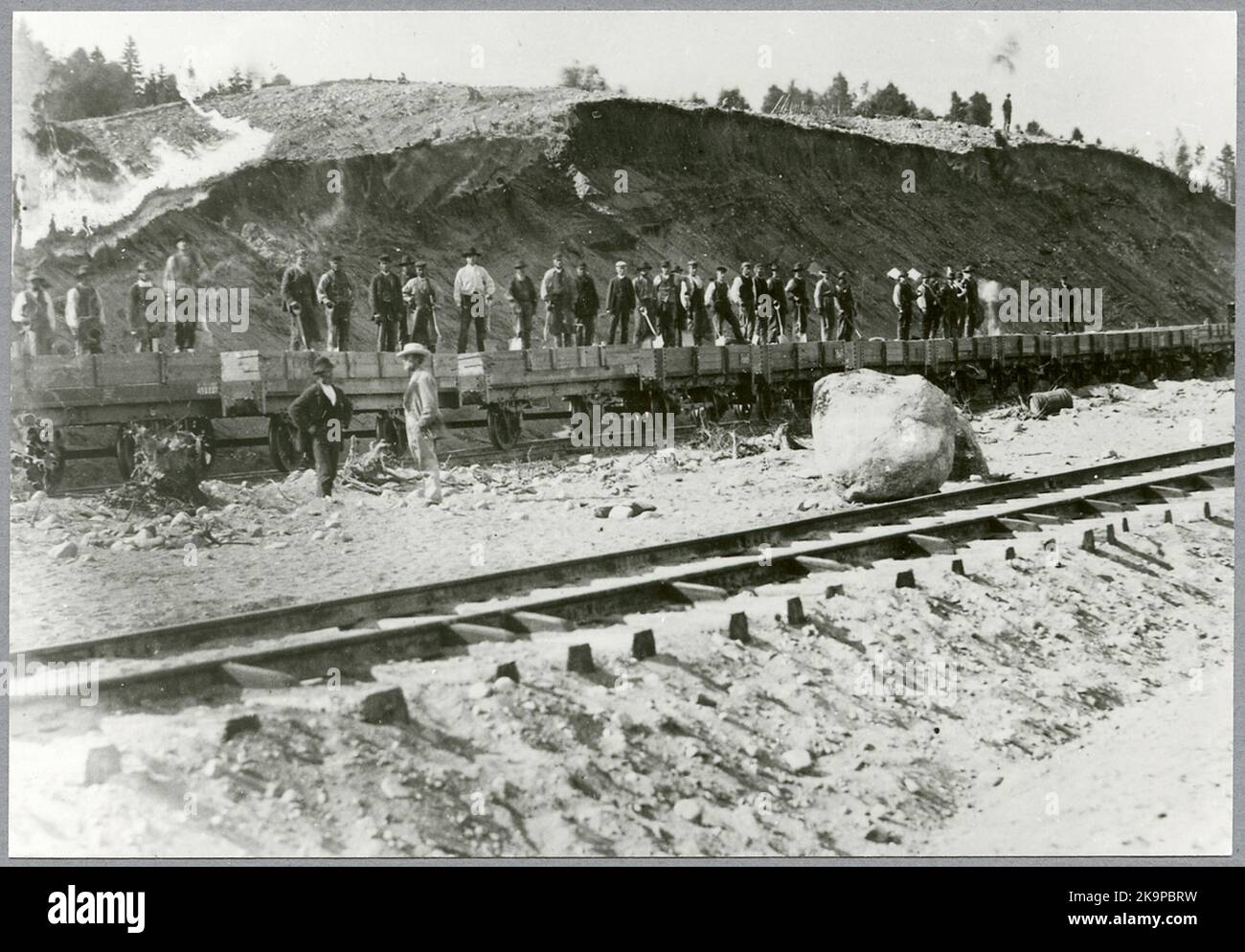 Staff standing on a gravel train in Finnhyttan's gravel pit Stock Photo ...