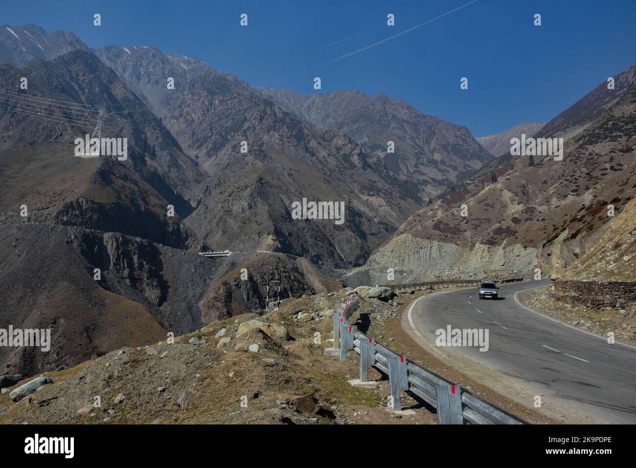 A vehicle moves along the Mughal road near the Pir Panjal Pass, also ...
