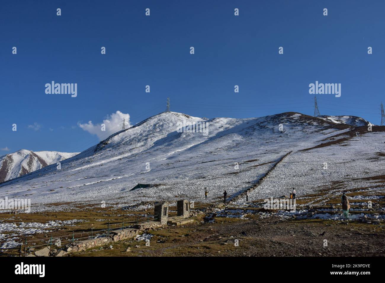 Visitors explore the snow covered Pir Panjal Pass, also called Peer Ki ...