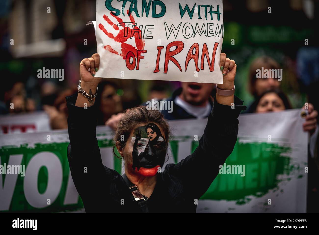 Barcelona, Spain. 29th Oct, 2022. An activist has her face painted ...