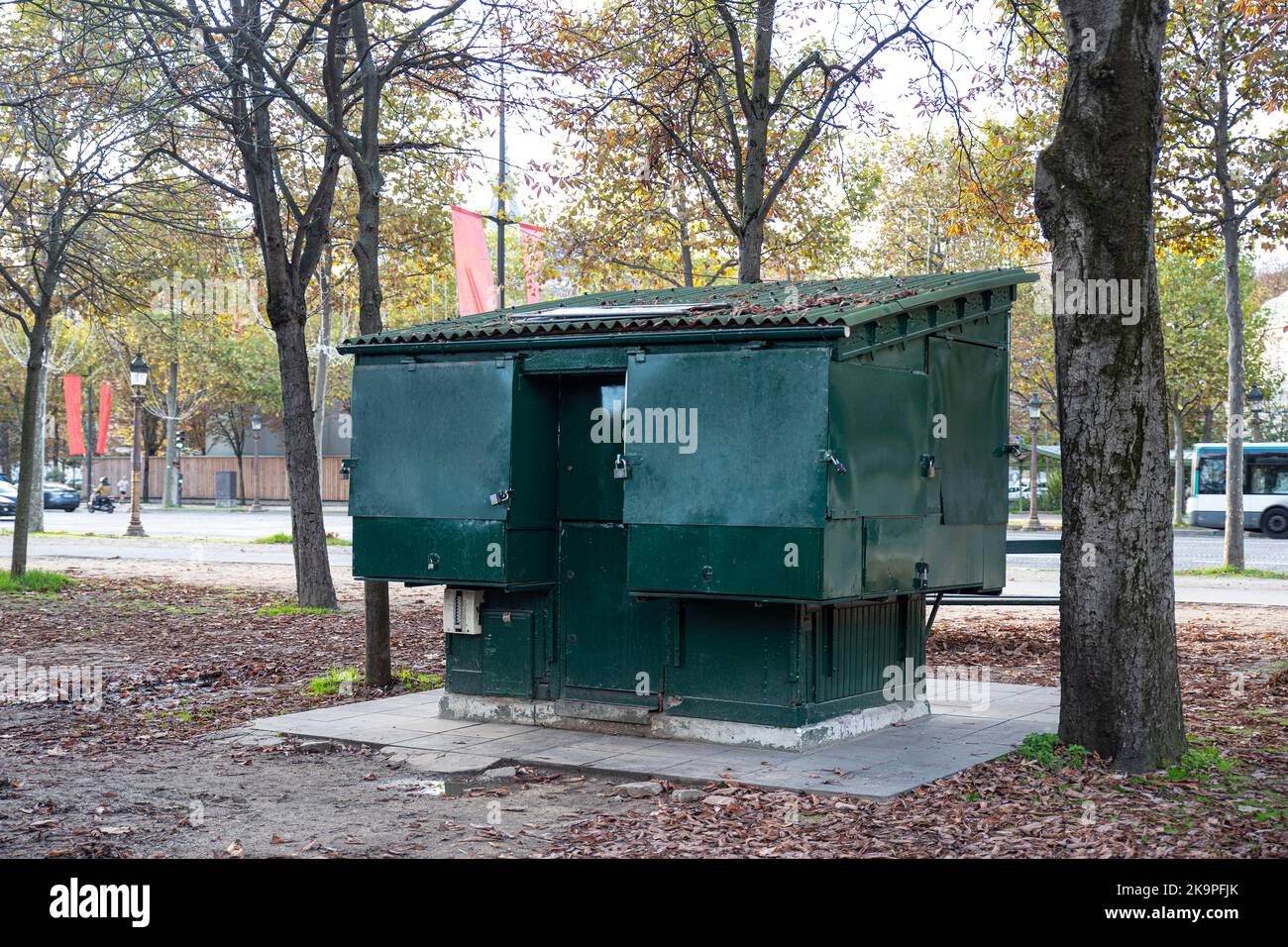 A typical green kiosk in the streets of Paris Stock Photo - Alamy