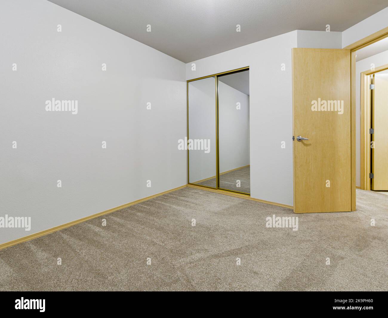 Modern residential empty bedroom interior Stock Photo - Alamy