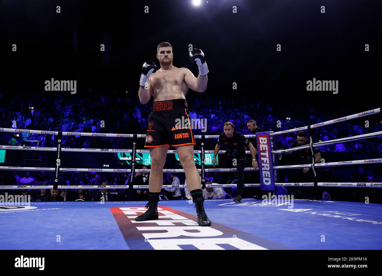 Johnny Fisher celebrates after winning his International Heavyweight ...