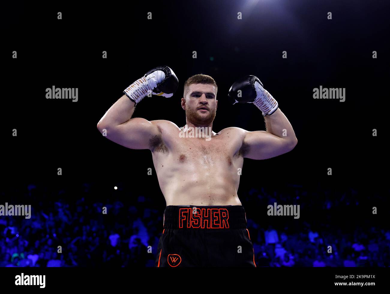 Johnny Fisher celebrates after winning his International Heavyweight ...