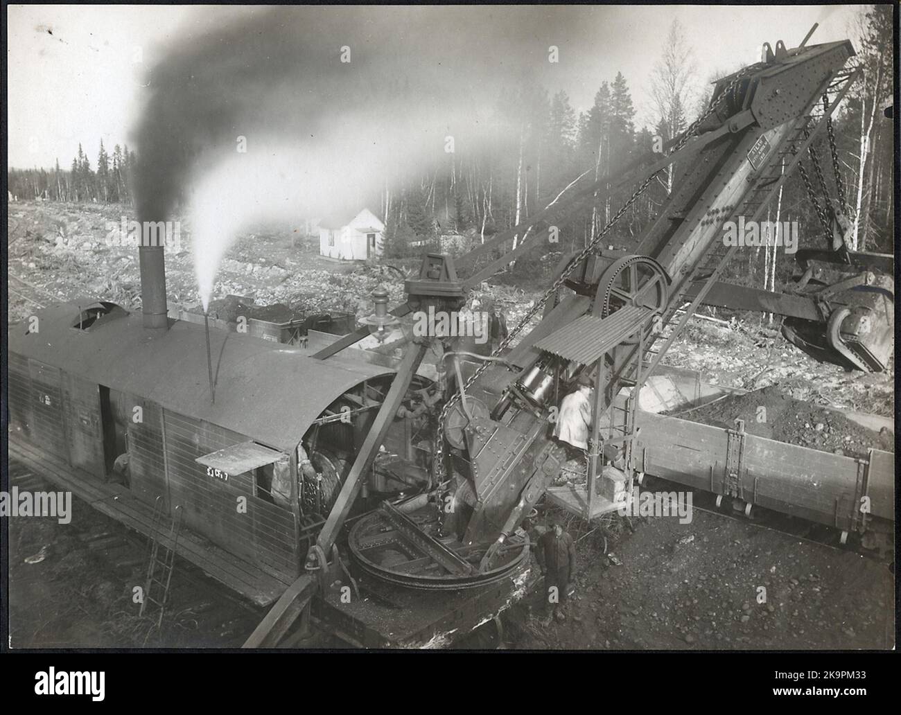 Steam excavator SJ CFB 7 in work. Made by Atlas Stockholm 1911 Stock ...