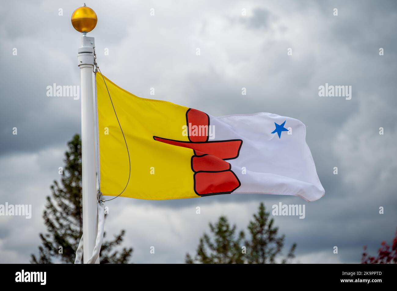 Flag of Nunavut waiving on a cloudy Canadian day Stock Photo - Alamy