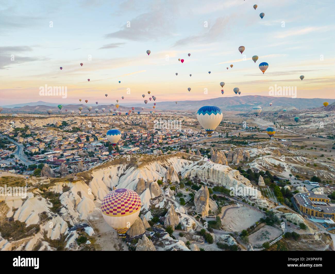 Spectacular drone view of hot air balloons ride over Turkey's iconic ...