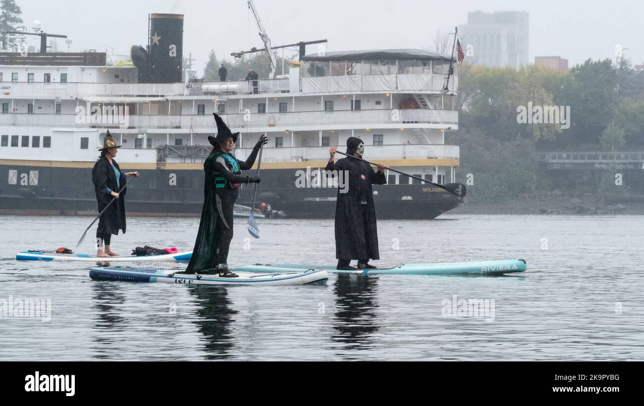 Witches on stand up paddleboards hi-res stock photography and images ...