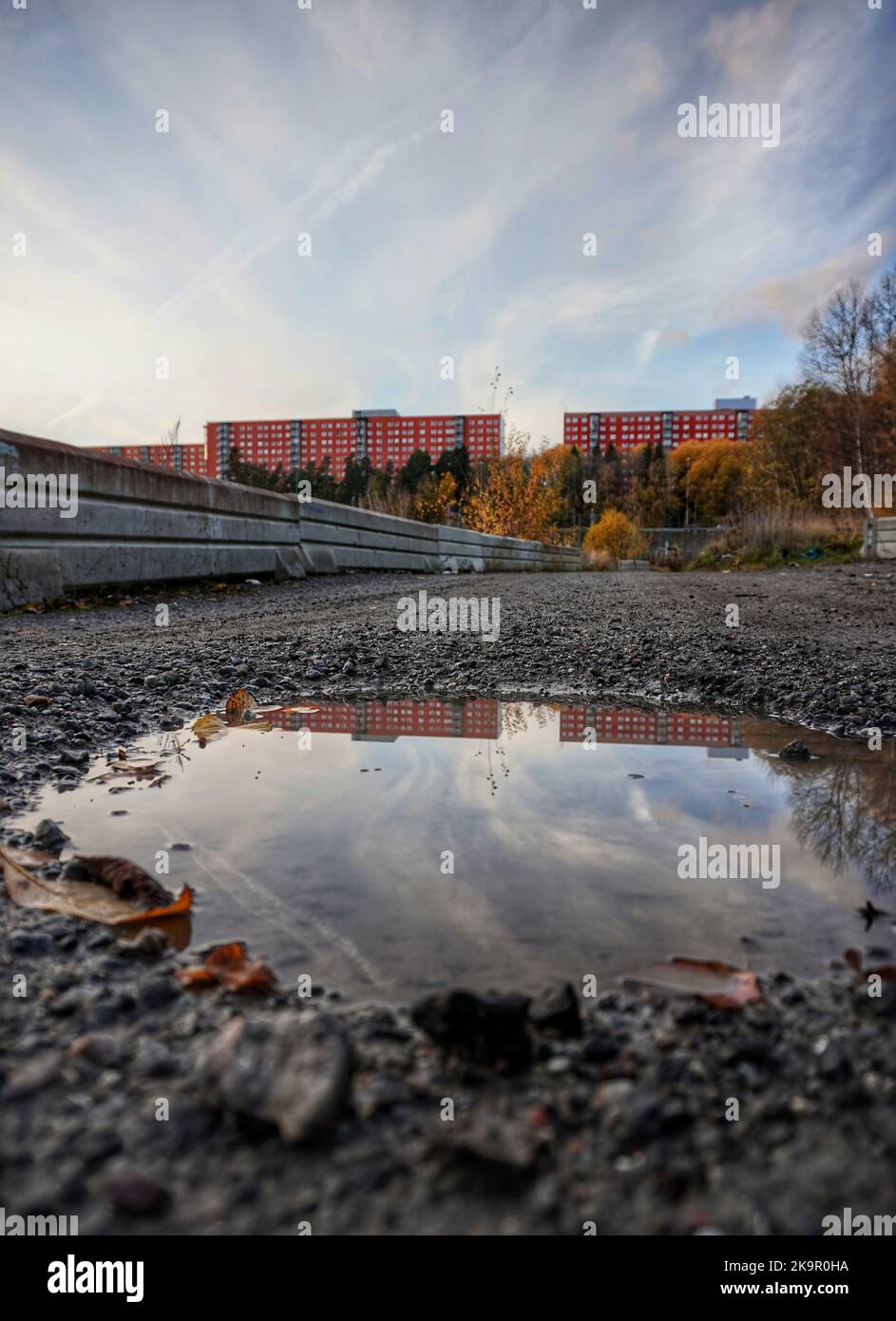 Puddle on ground at a construction site Stock Photo - Alamy