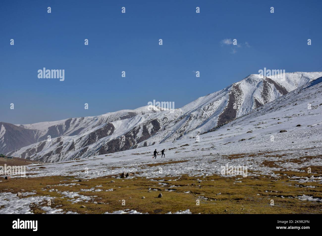 Visitors explore the snow covered Pir Panjal Pass, also called Peer Ki ...