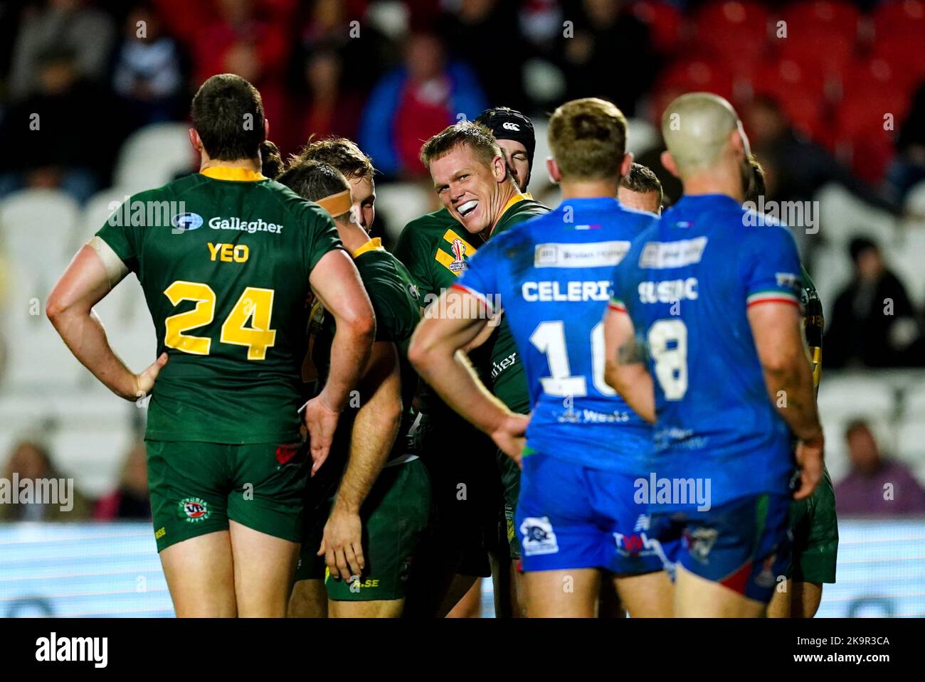 Australia's Lindsay Collins (centre) celebrates with his team-mates ...