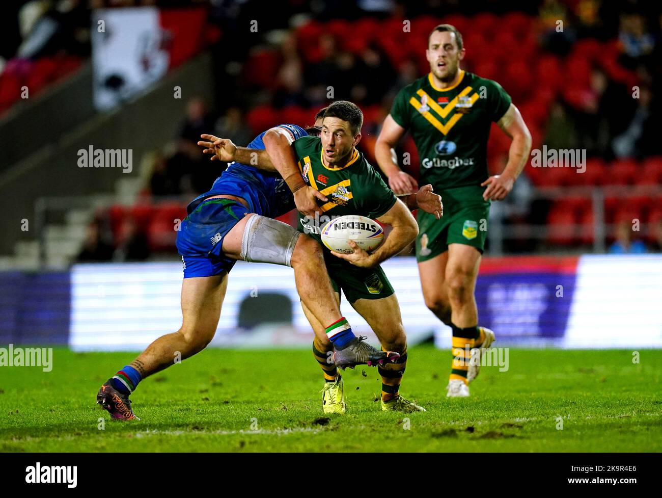 Australia's Ben Hunt is tackled during the Rugby League World Cup group ...