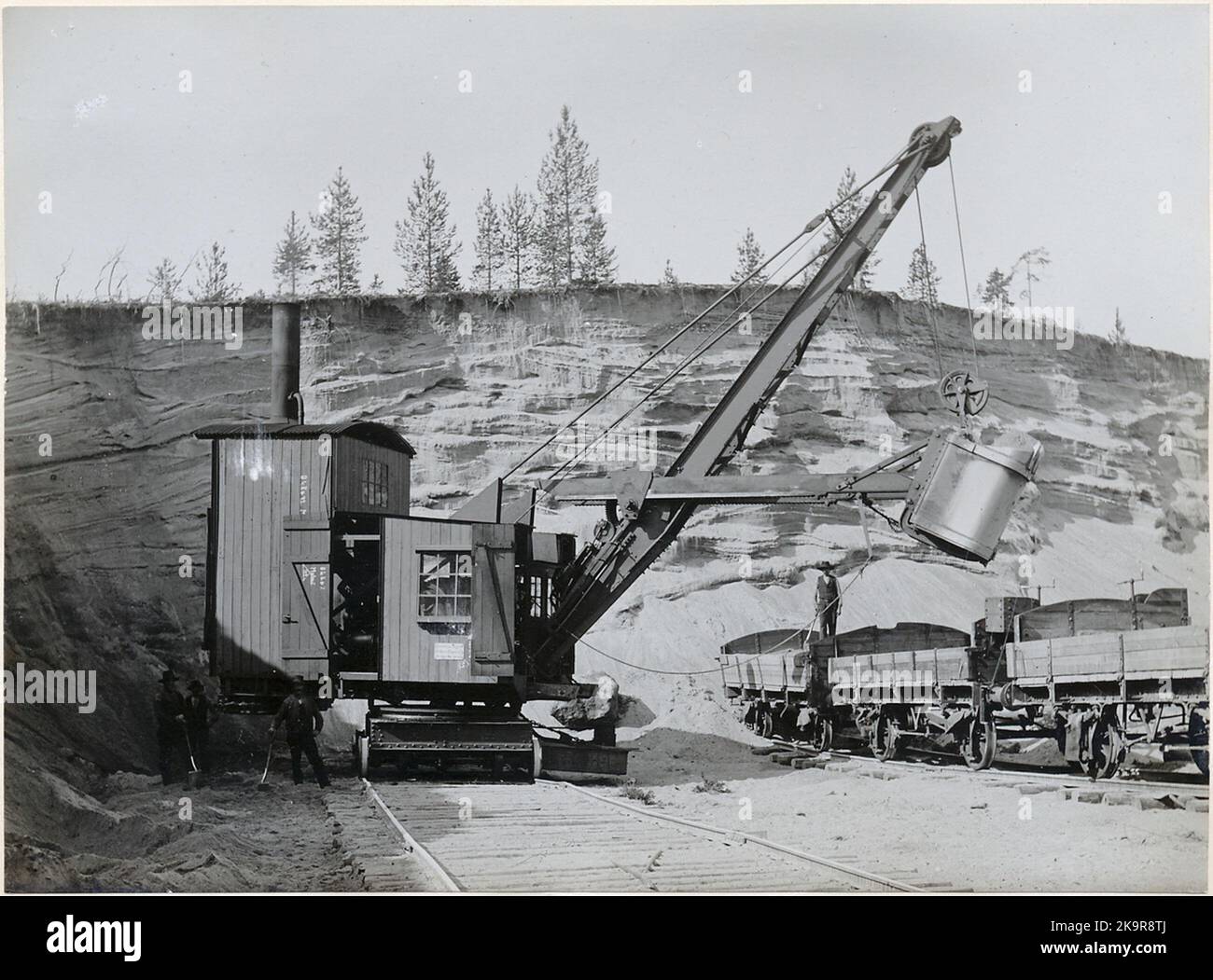Gravel roof with a steam -driven excavator Stock Photo - Alamy