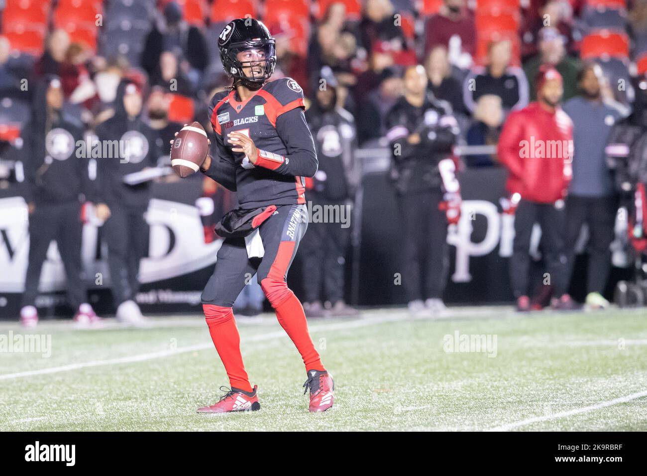 October 29, 2022: Ottawa Redblacks quarterback Tyrie Adams (7) sets to ...