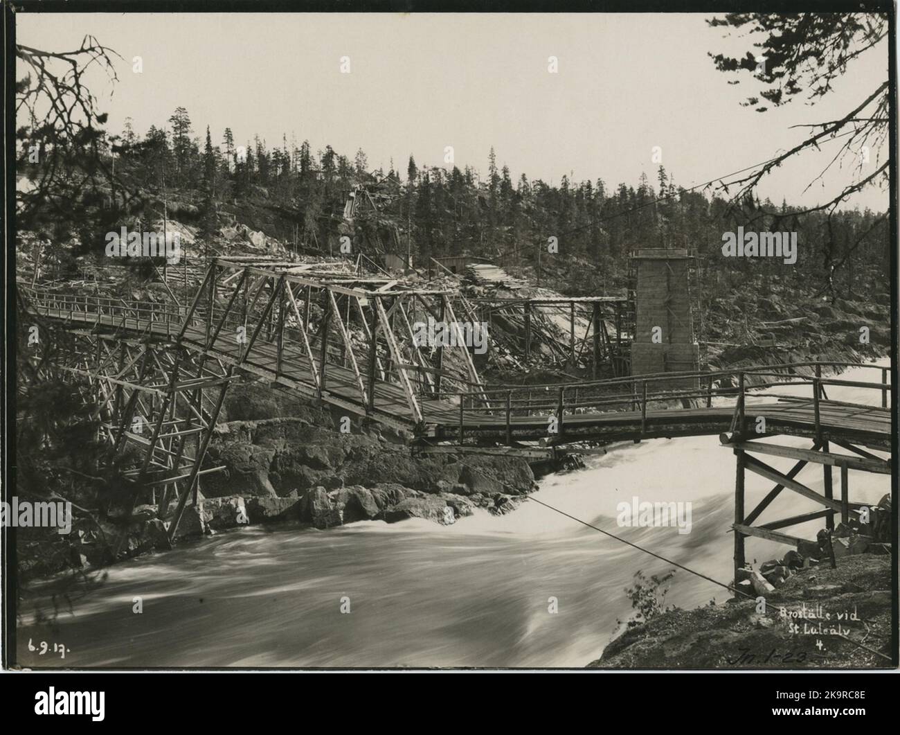 Railway bridge construction at Stora Lule River. Provisional road ...