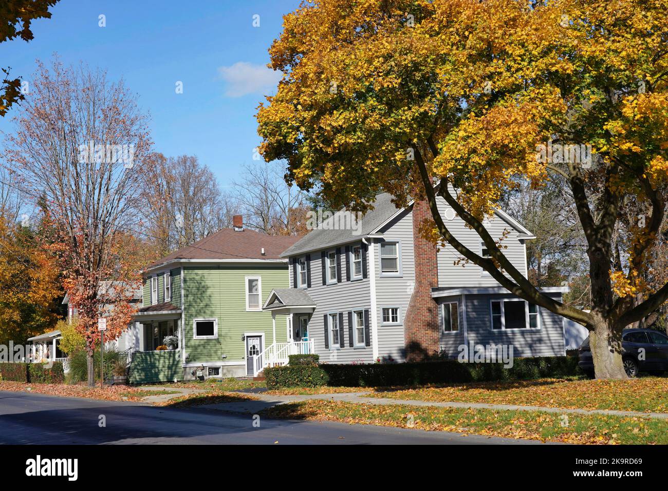 Suburban residential street with bright fall colors and middle class ...