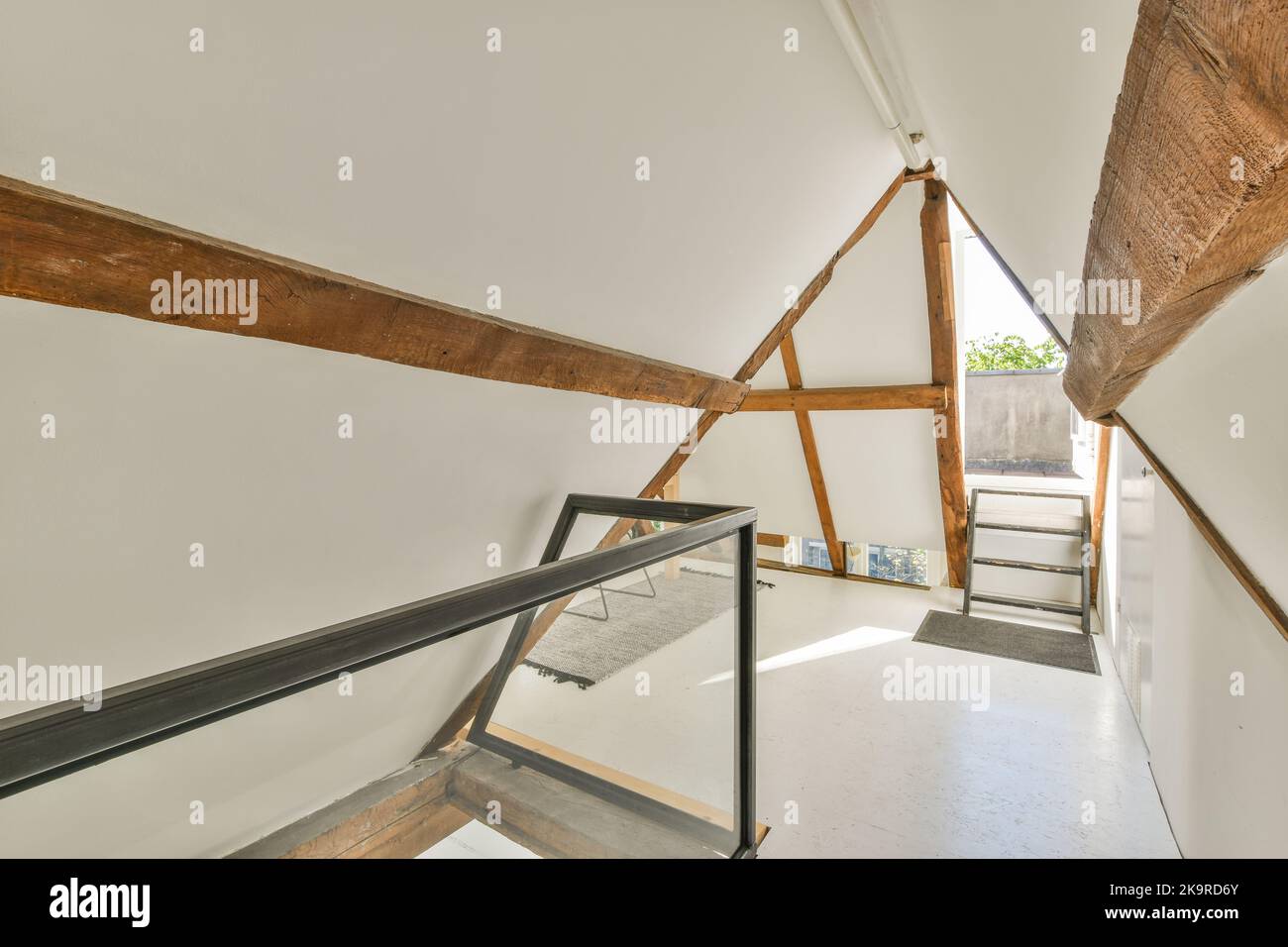 Room with door to balcony and narrow long corridor in perspective in ...