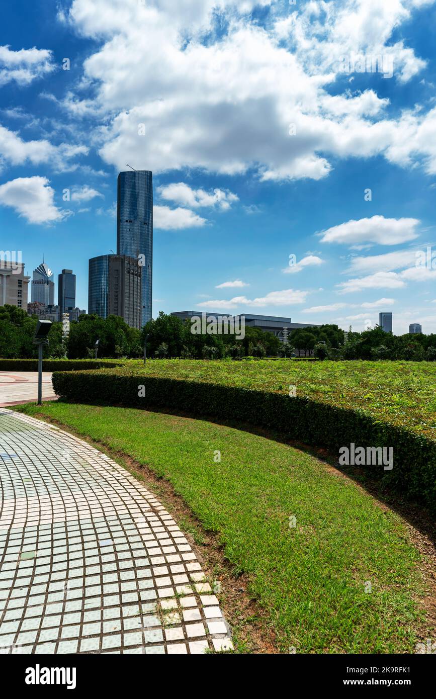 city park with modern building background in shanghai Stock Photo - Alamy