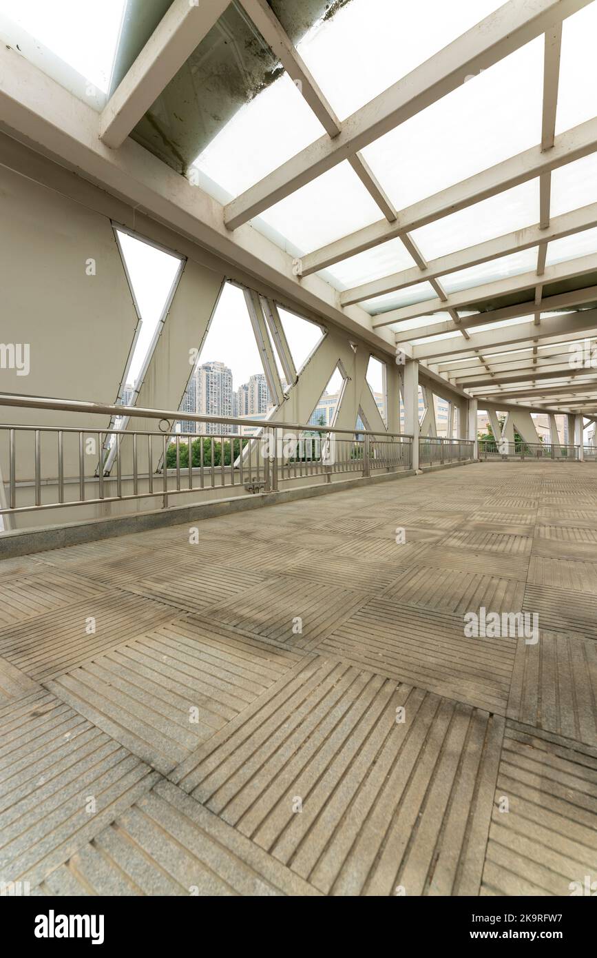 Inside of a modern overhead pedestrian bridge Stock Photo - Alamy