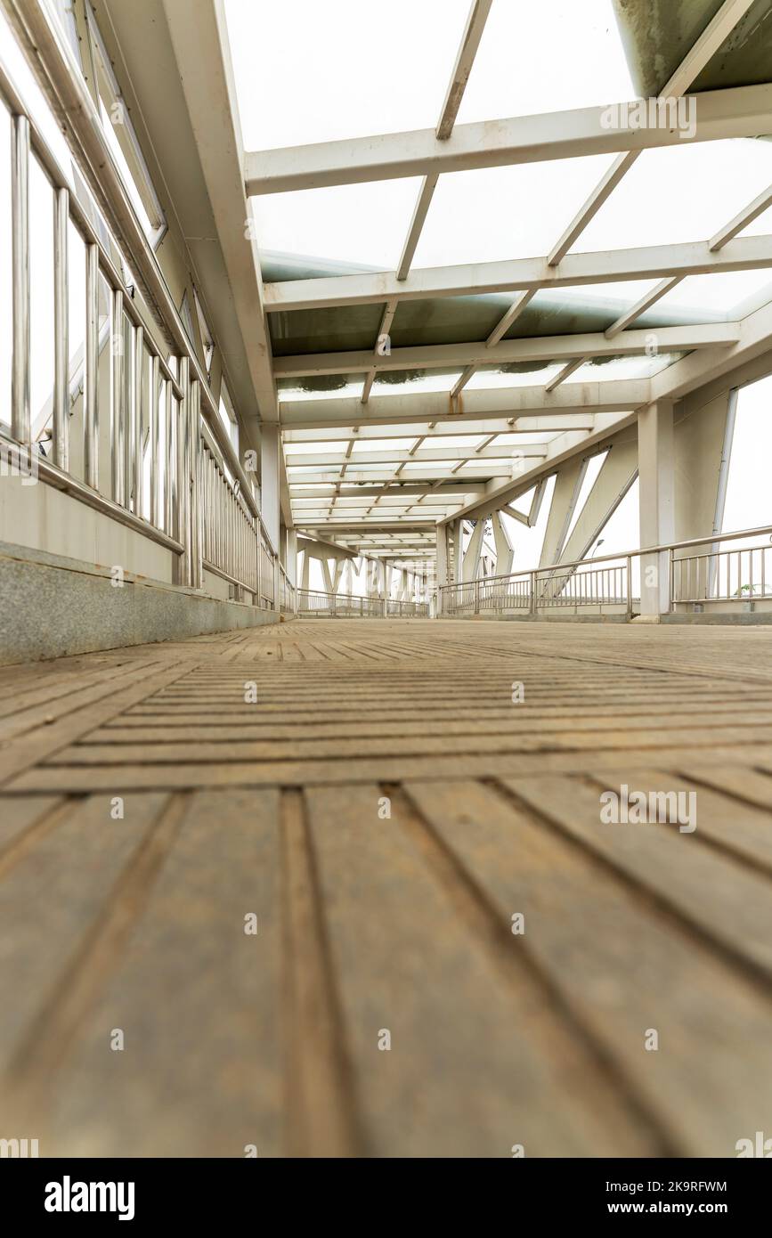Inside of a modern overhead pedestrian bridge Stock Photo - Alamy