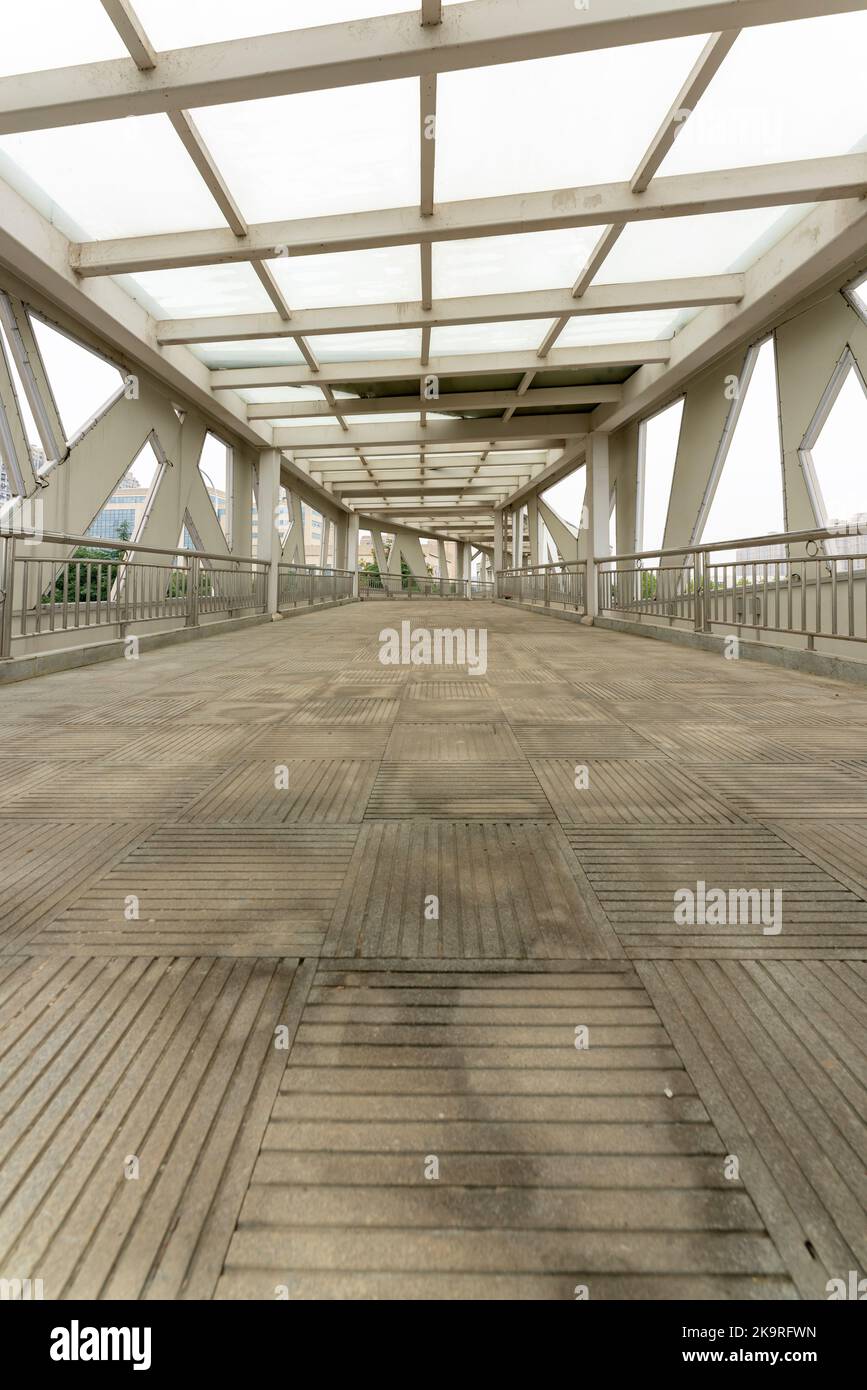 Inside of a modern overhead pedestrian bridge Stock Photo - Alamy