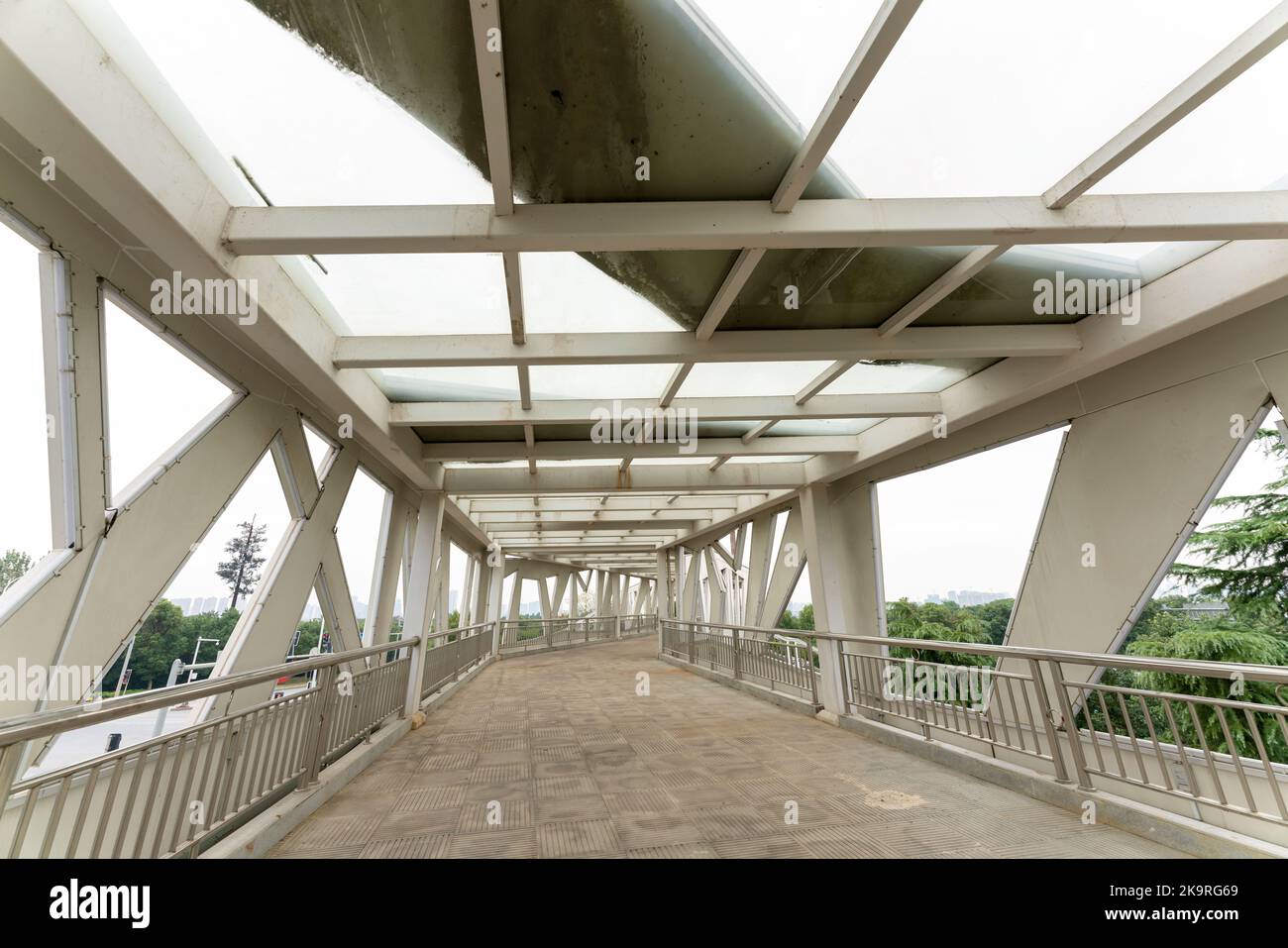 Inside of a modern overhead pedestrian bridge Stock Photo - Alamy