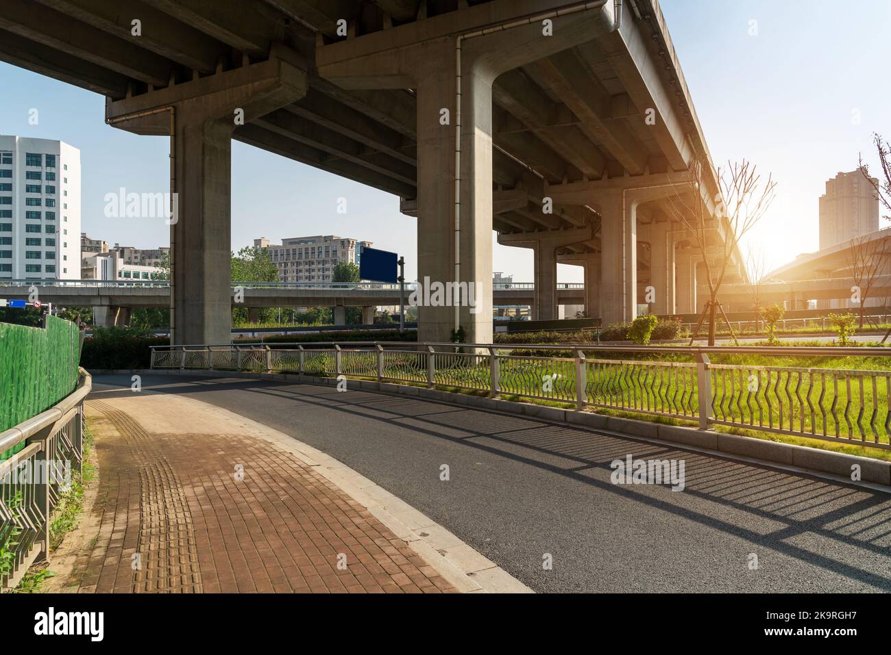 Concrete structure and asphalt road space under the overpass in the ...
