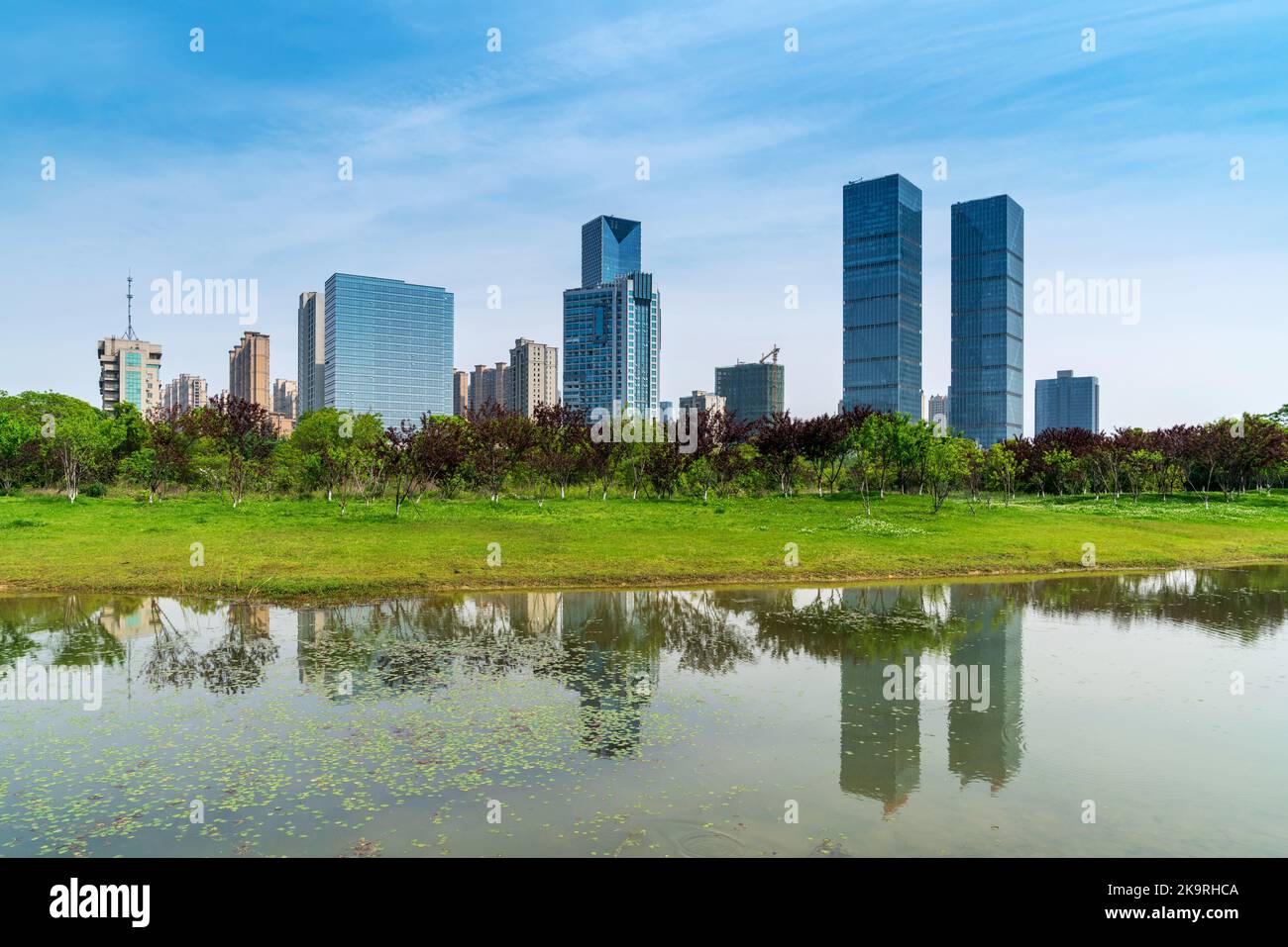 Lakeside modern office building in China Stock Photo - Alamy