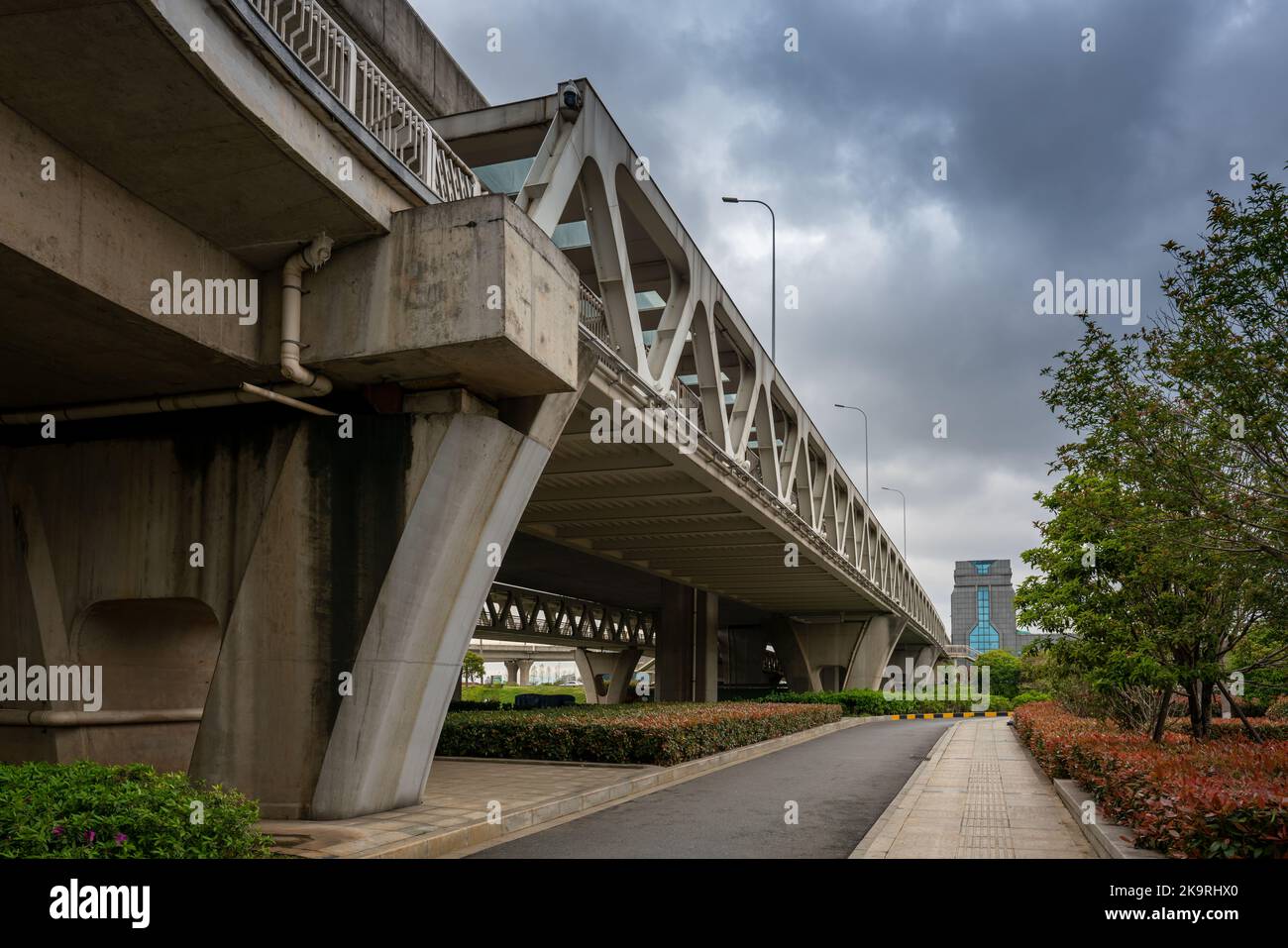 Concrete structure and asphalt road space under the overpass in the ...