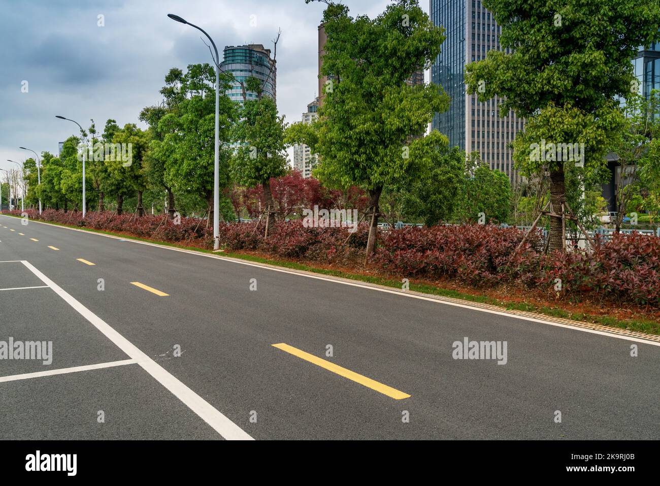 Empty urban road and buildings in China Stock Photo - Alamy