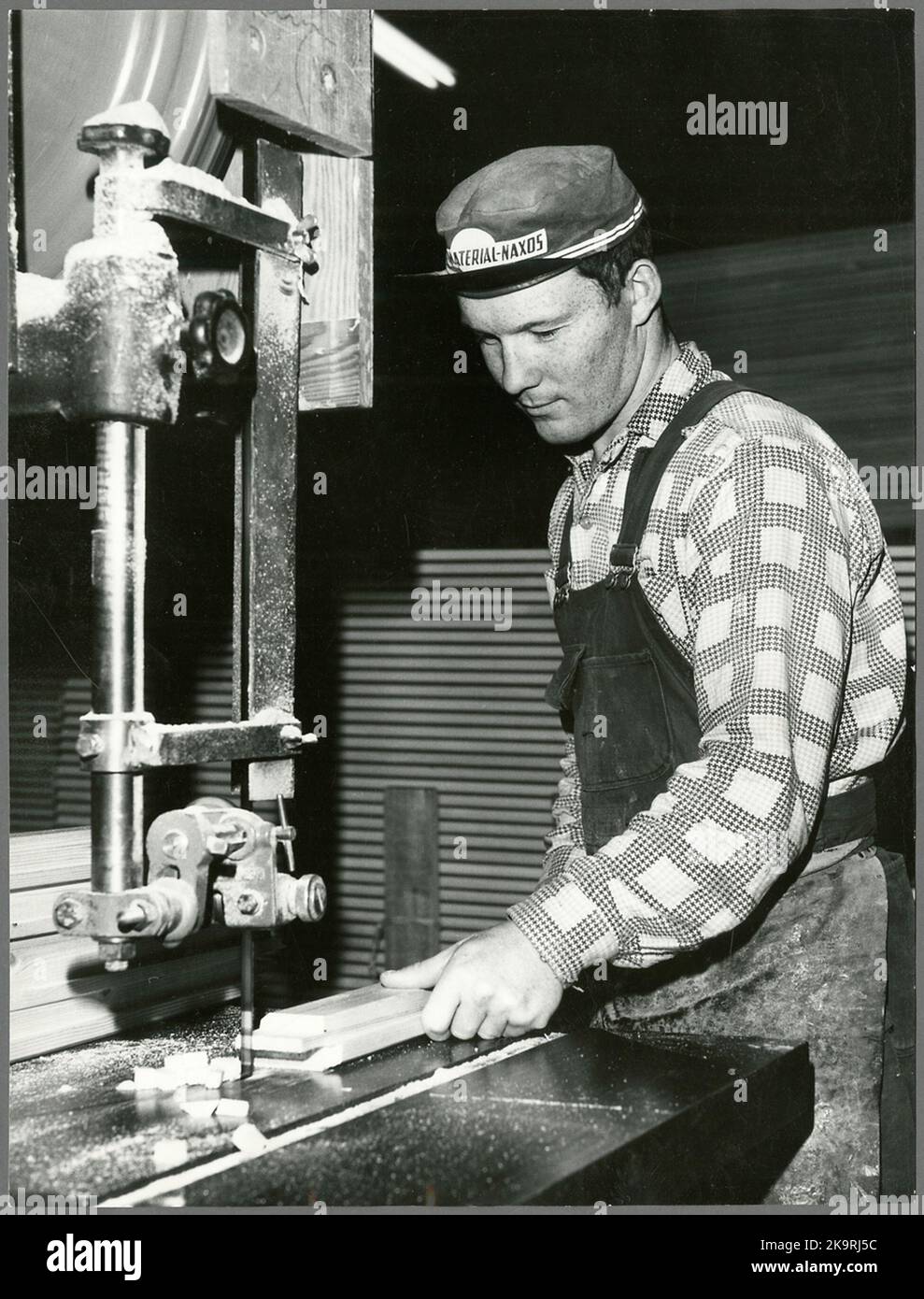 Man at machine saw Stock Photo - Alamy