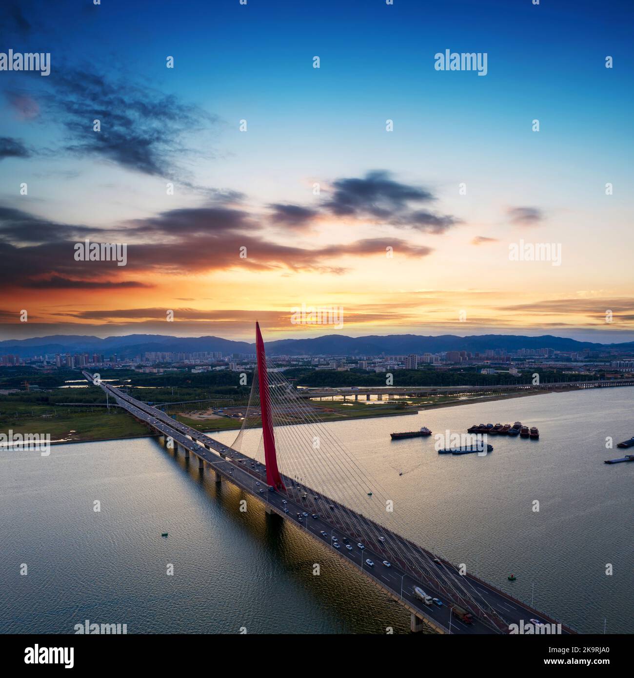 Cable stayed bridge at sunset Stock Photo - Alamy