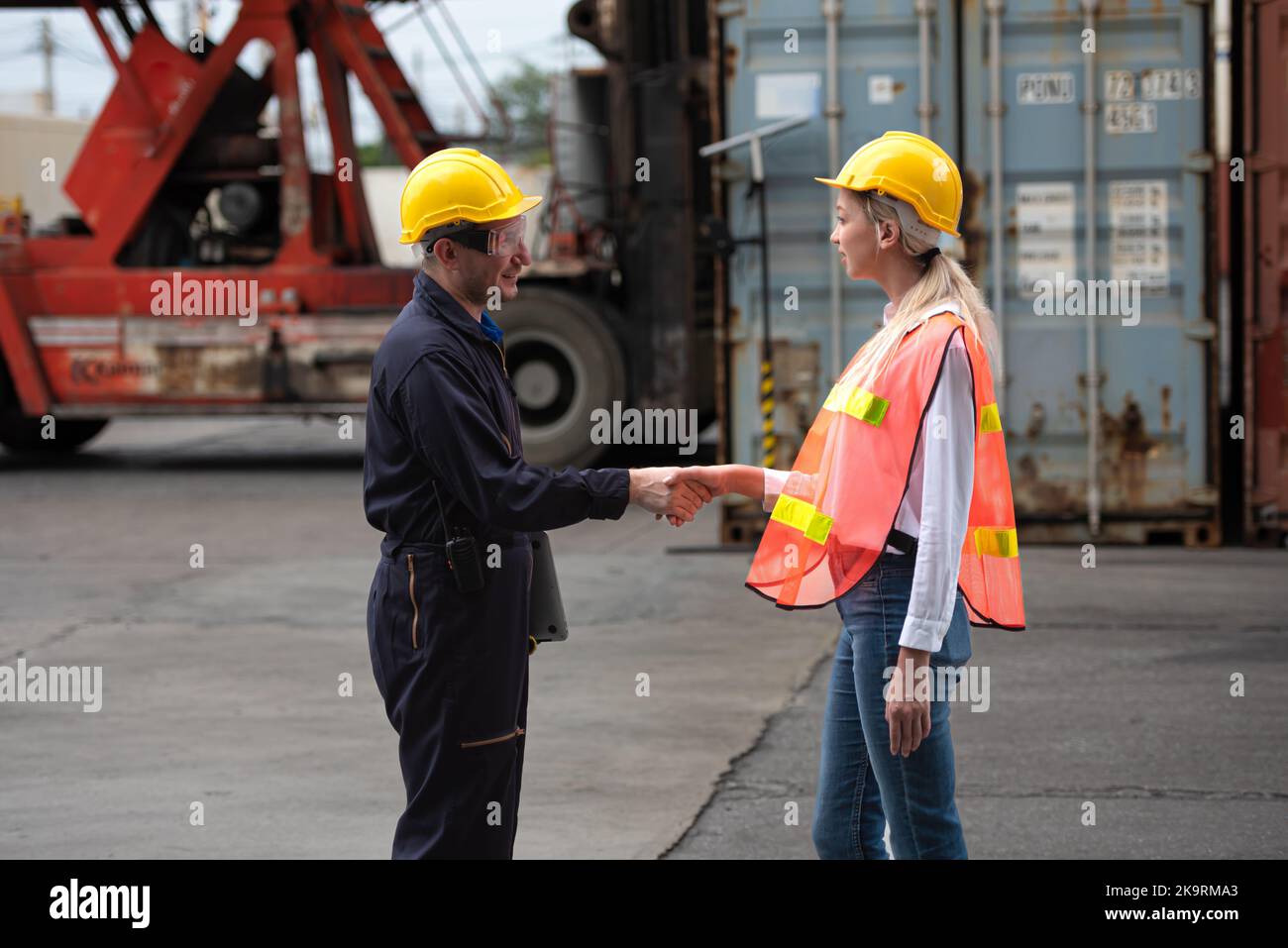 Business people shaking hands together at cargo warehouse port Stock ...