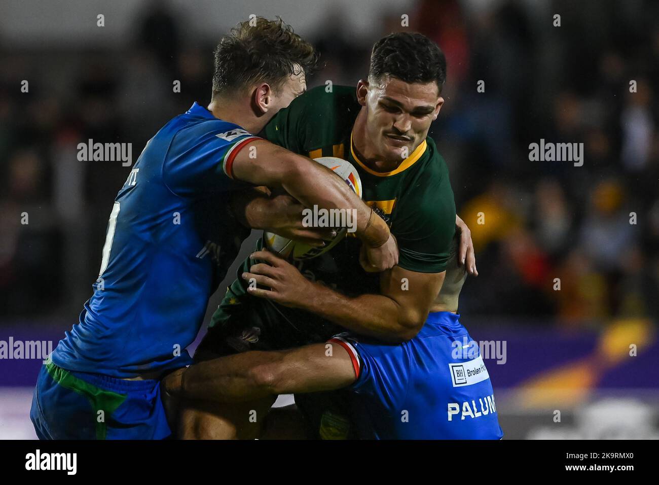 Nathan Cleary of Australia is tackled by Ronnie Palumbo of Italy during ...