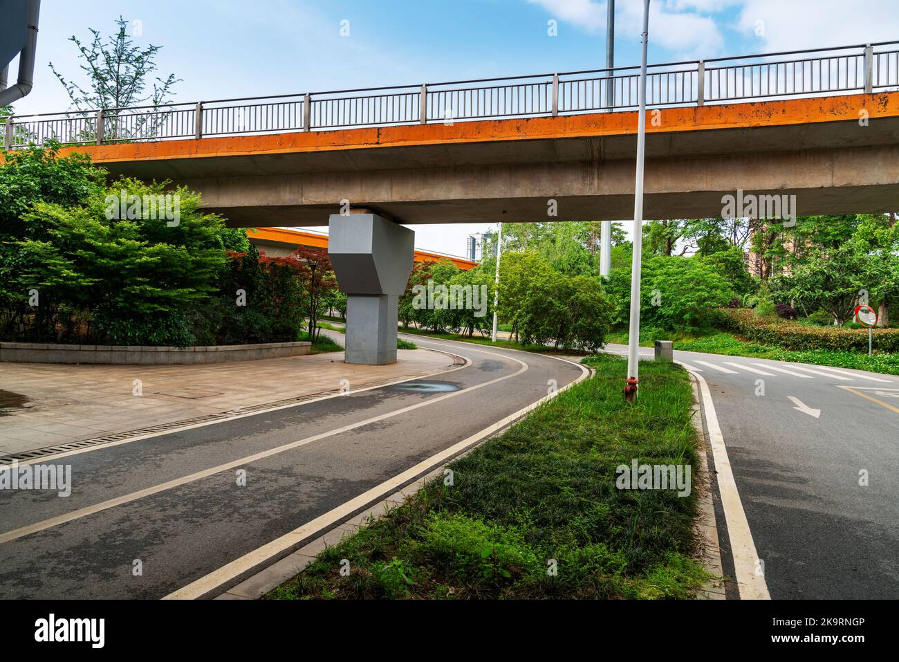 Concrete structure and asphalt road space under the overpass in the ...