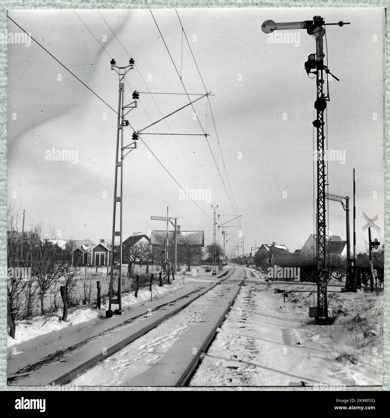Railway crossing west of the station Stock Photo - Alamy