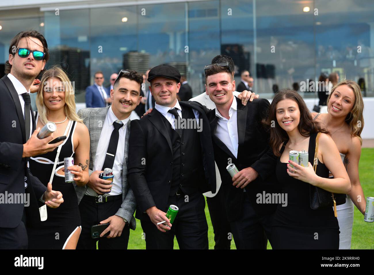 Jockeys and people take part during Melbourne Cup Carnival 2022 at ...