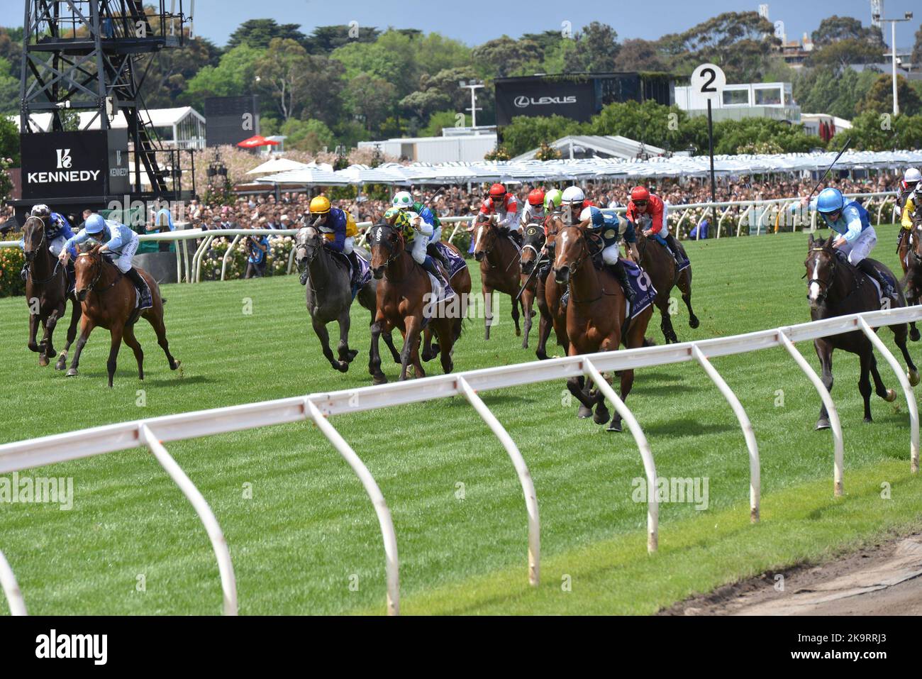 Jockeys and people take part during Melbourne Cup Carnival 2022 at ...