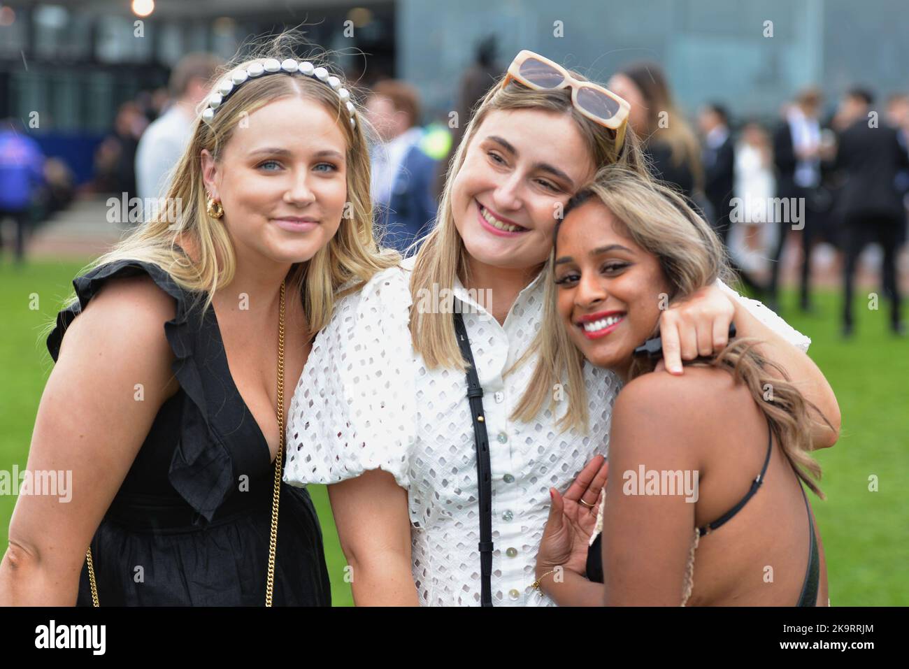 Jockeys and people take part during Melbourne Cup Carnival 2022 at ...
