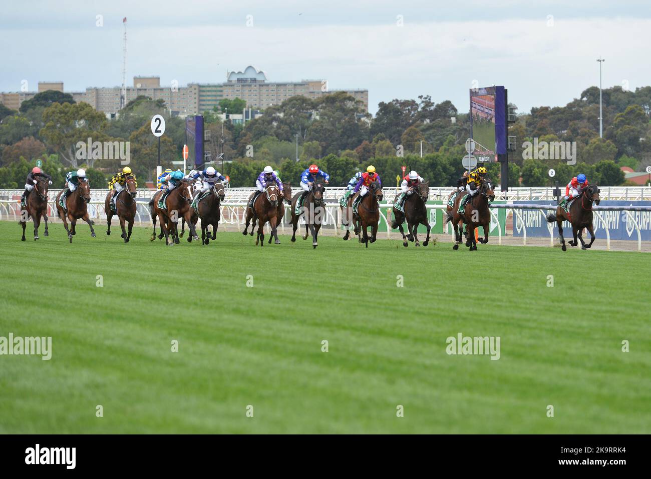 Jockeys and people take part during Melbourne Cup Carnival 2022 at ...