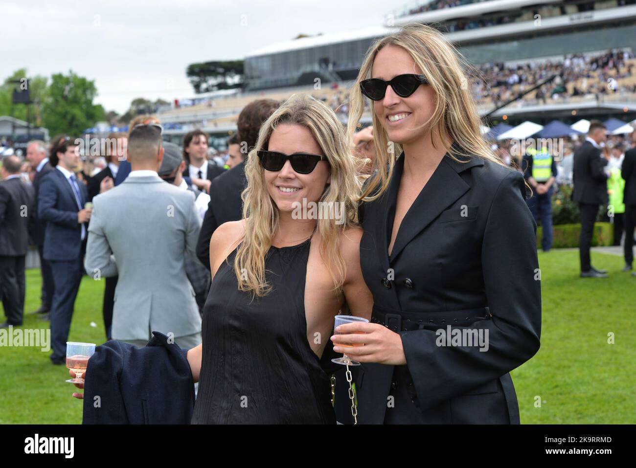 Jockeys and people take part during Melbourne Cup Carnival 2022 at ...