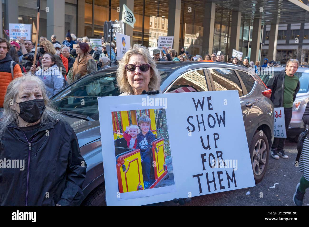 New York, USA. 29th Oct, 2022. Climate activists hold signs in front of ...