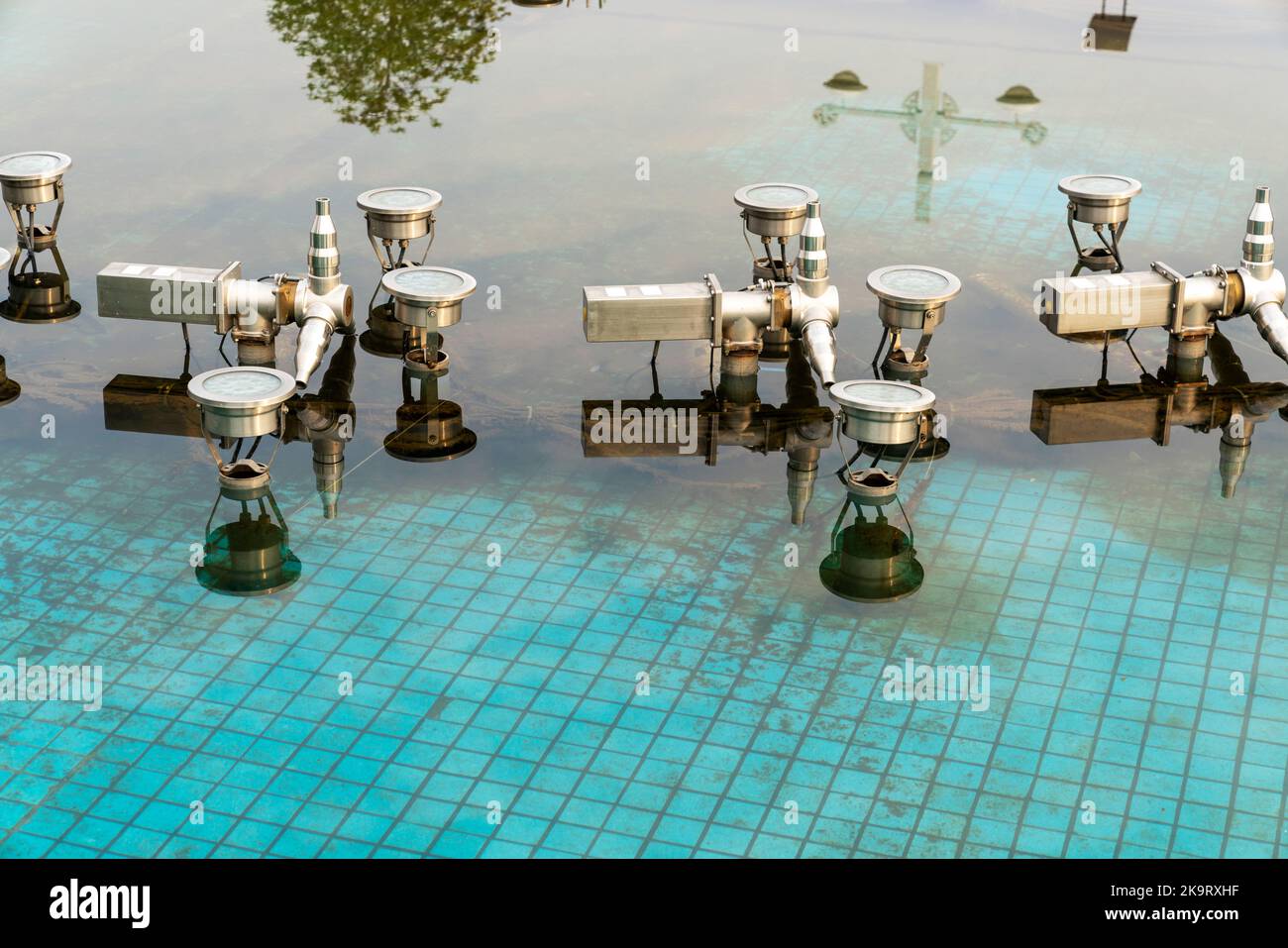 pipe system and lights in an empty fountain Stock Photo - Alamy