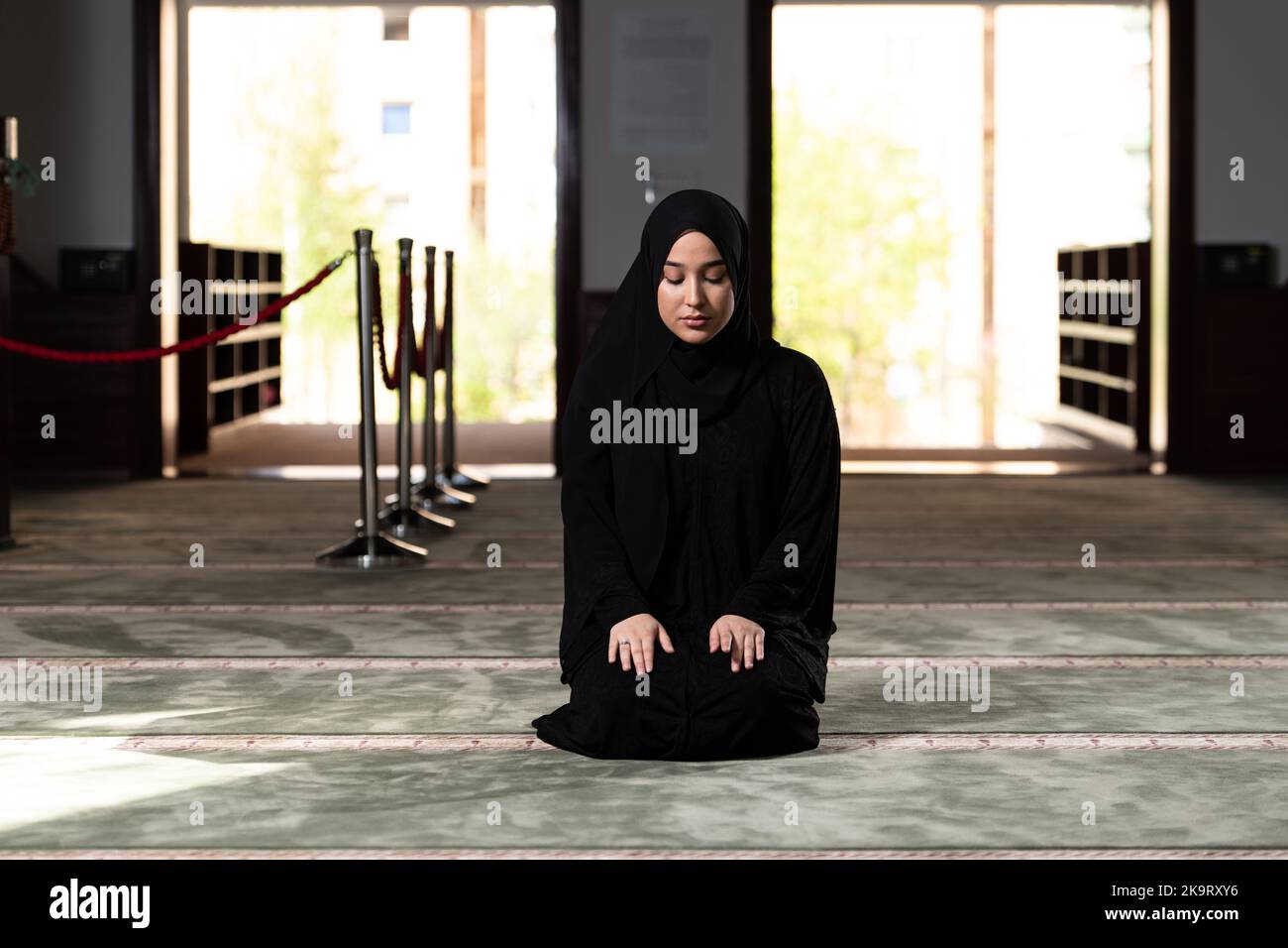 Muslim Woman Who is Wearing the Islamic Long Hijab Khimar Was Praying ...